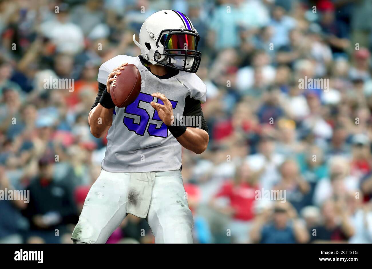 American football quarterback getting ready to throw a ball with ...