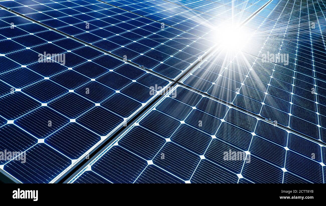 Close-up of solar panels reflecting sun Stock Photo - Alamy