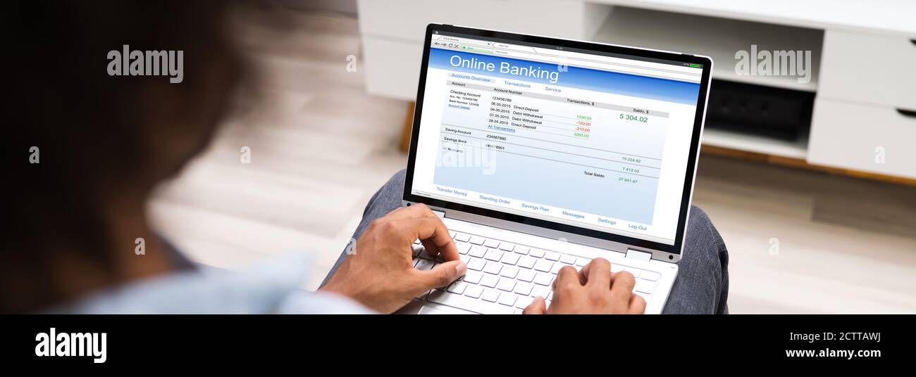 African American Man Using Online Bank To Pay Stock Photo - Alamy