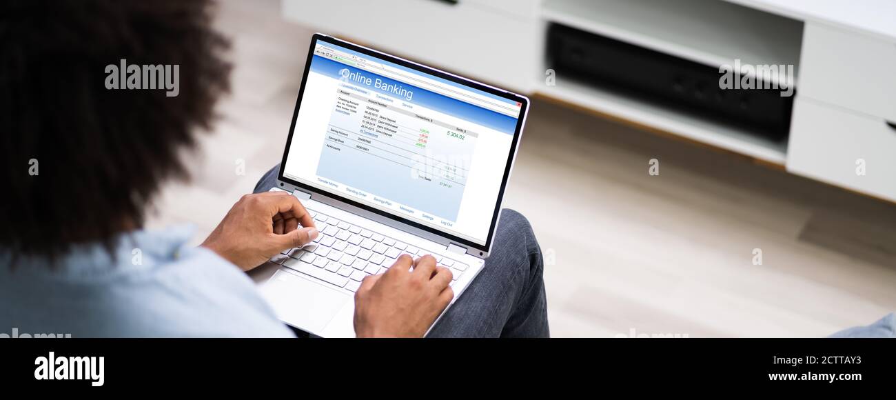 African American Man Using Online Bank App Stock Photo - Alamy