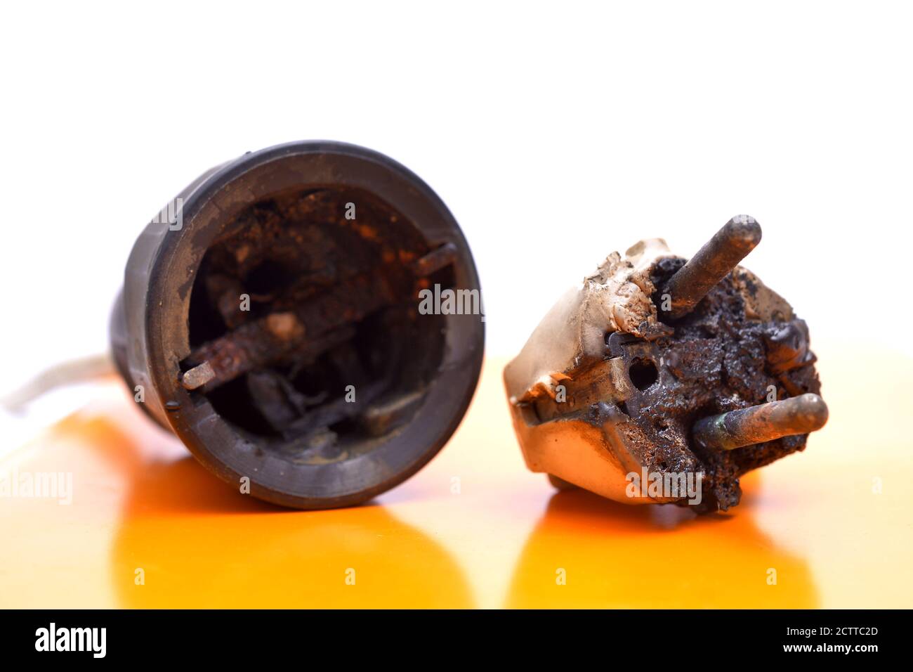 Electric plug damaged by overheating image Stock Photo - Alamy