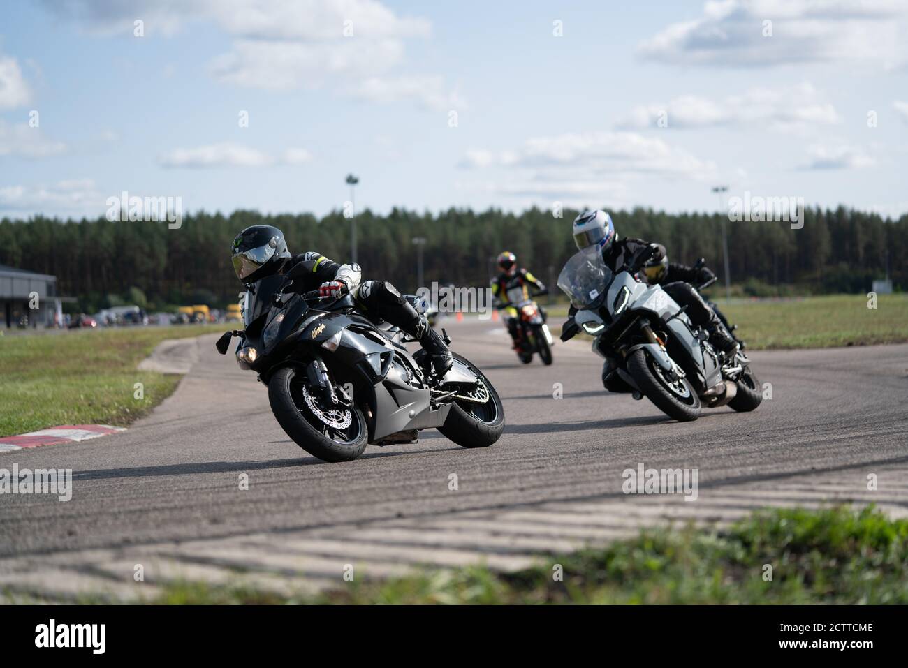 05-09-2020 Riga, Latvia Man on a motorbike on the road riding. having ...
