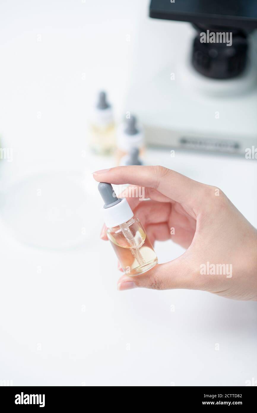 Science, chemistry, biology, and medicine concept, scientist with ...