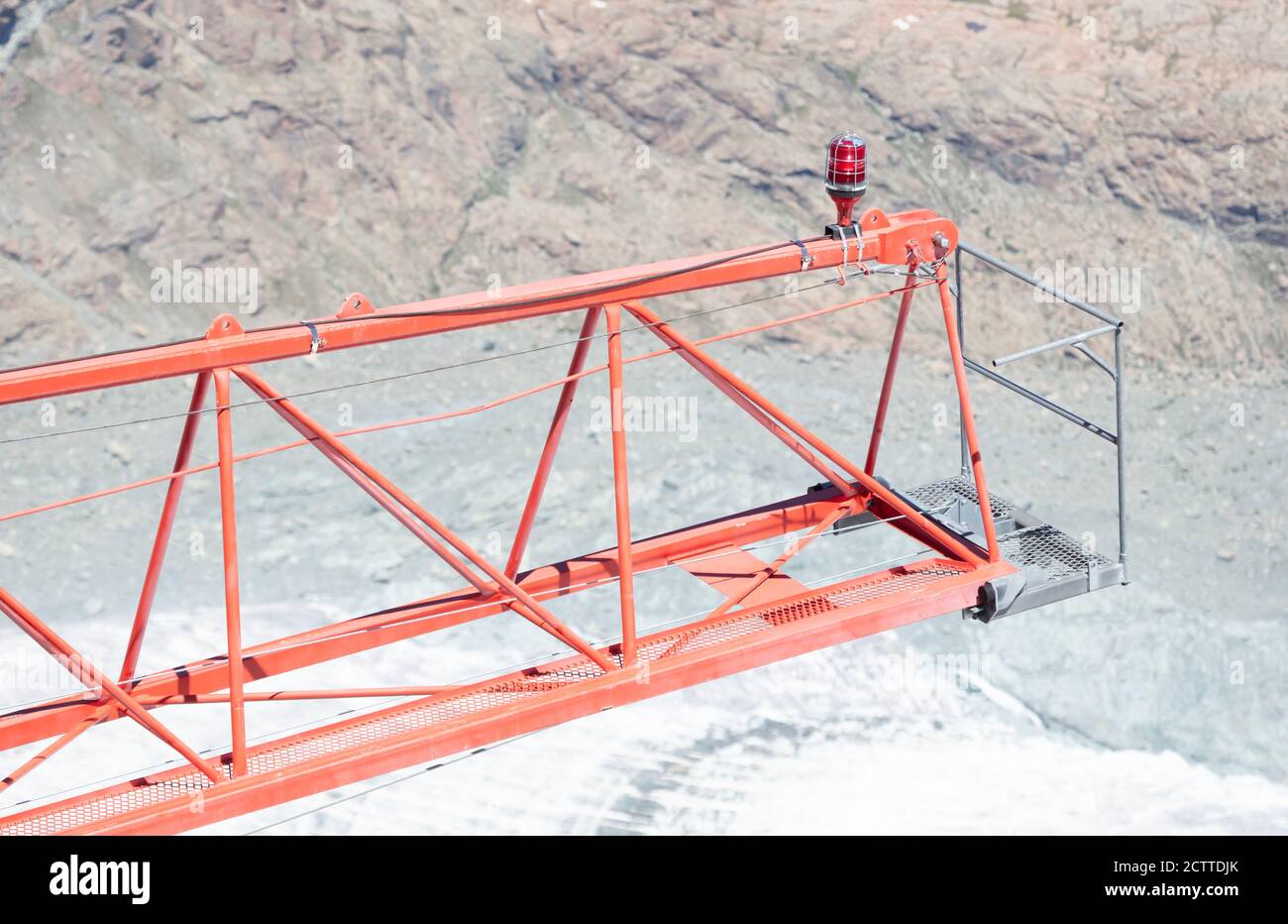 Industrial crane closeup, building something in the mountains Stock ...