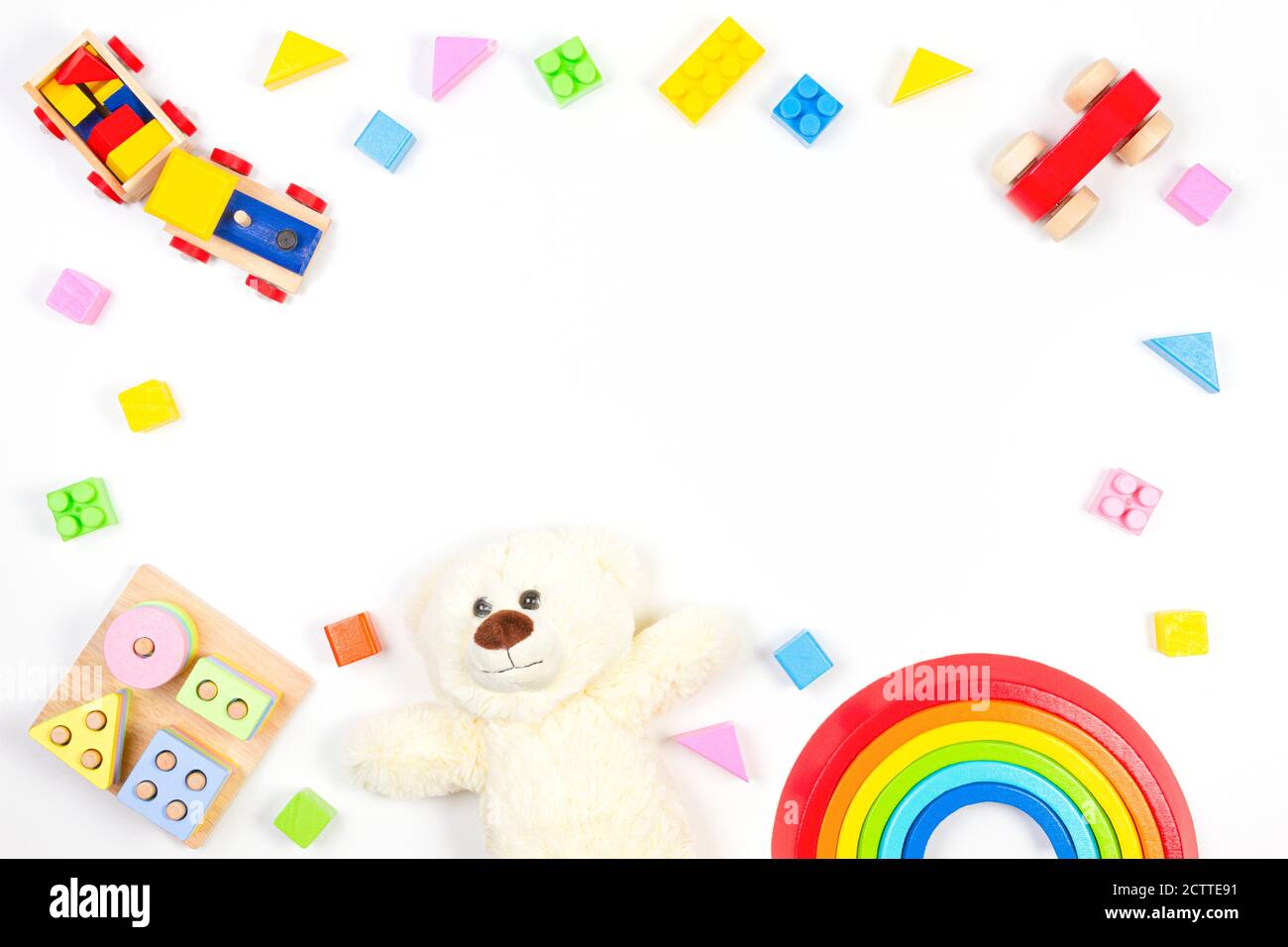 Baby kids toy frame on white background with teddy bear and colorful ...
