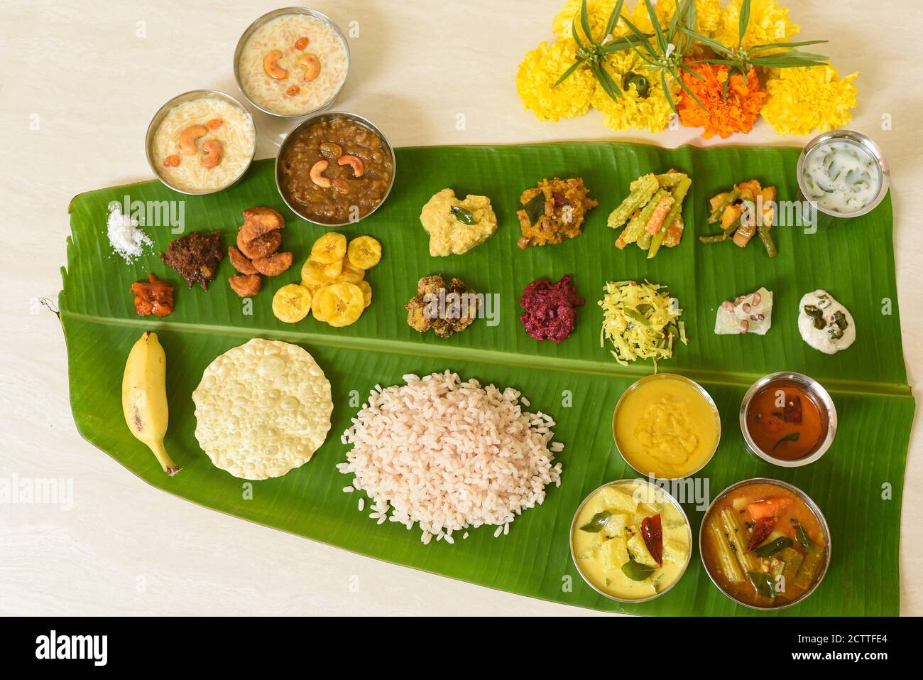 Onam sadhya, Indian women eating with hand boiled rice, served for ...
