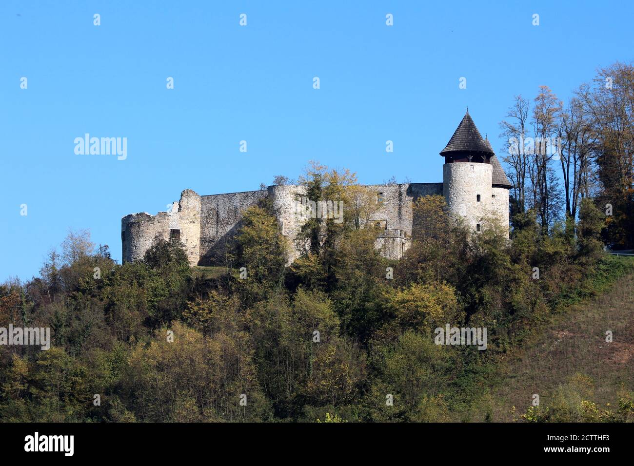 Abandoned old stone medieval town castle with two partially renovated ...
