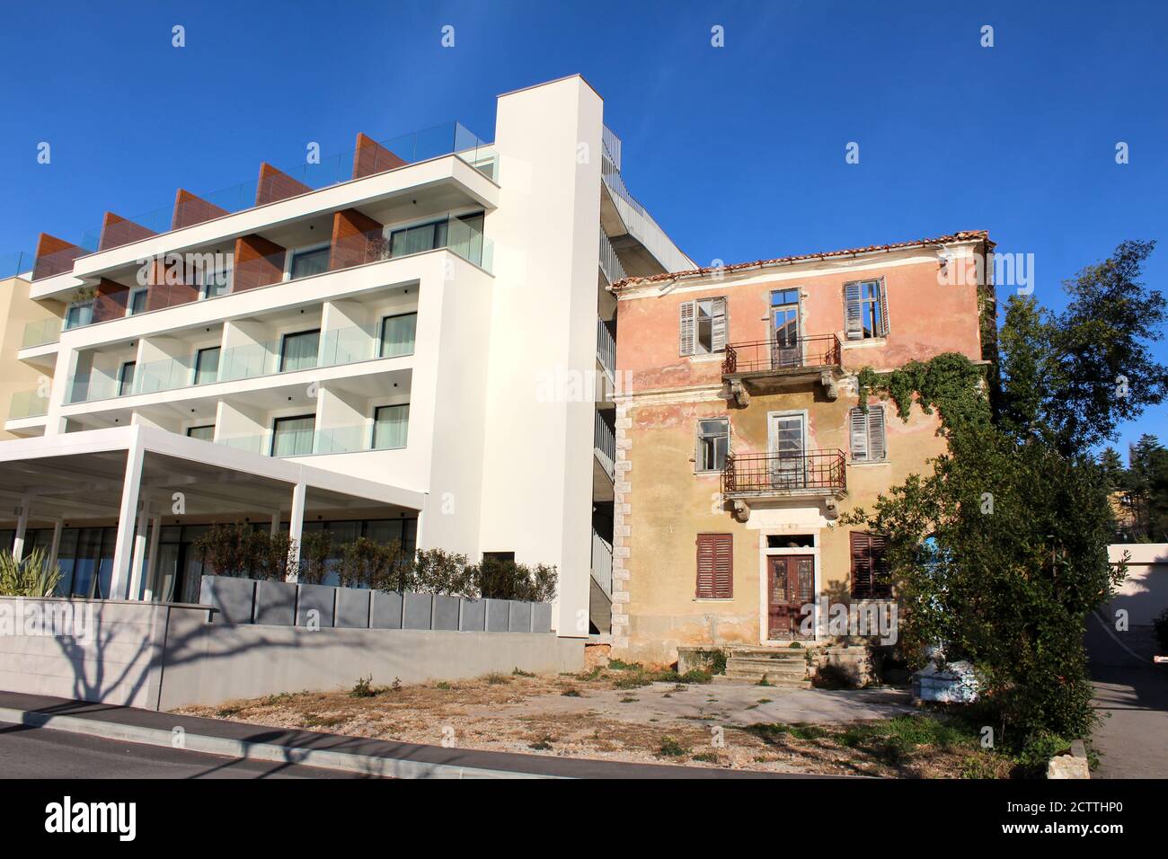 New exclusive five star hotel building next to abandoned destroyed ...