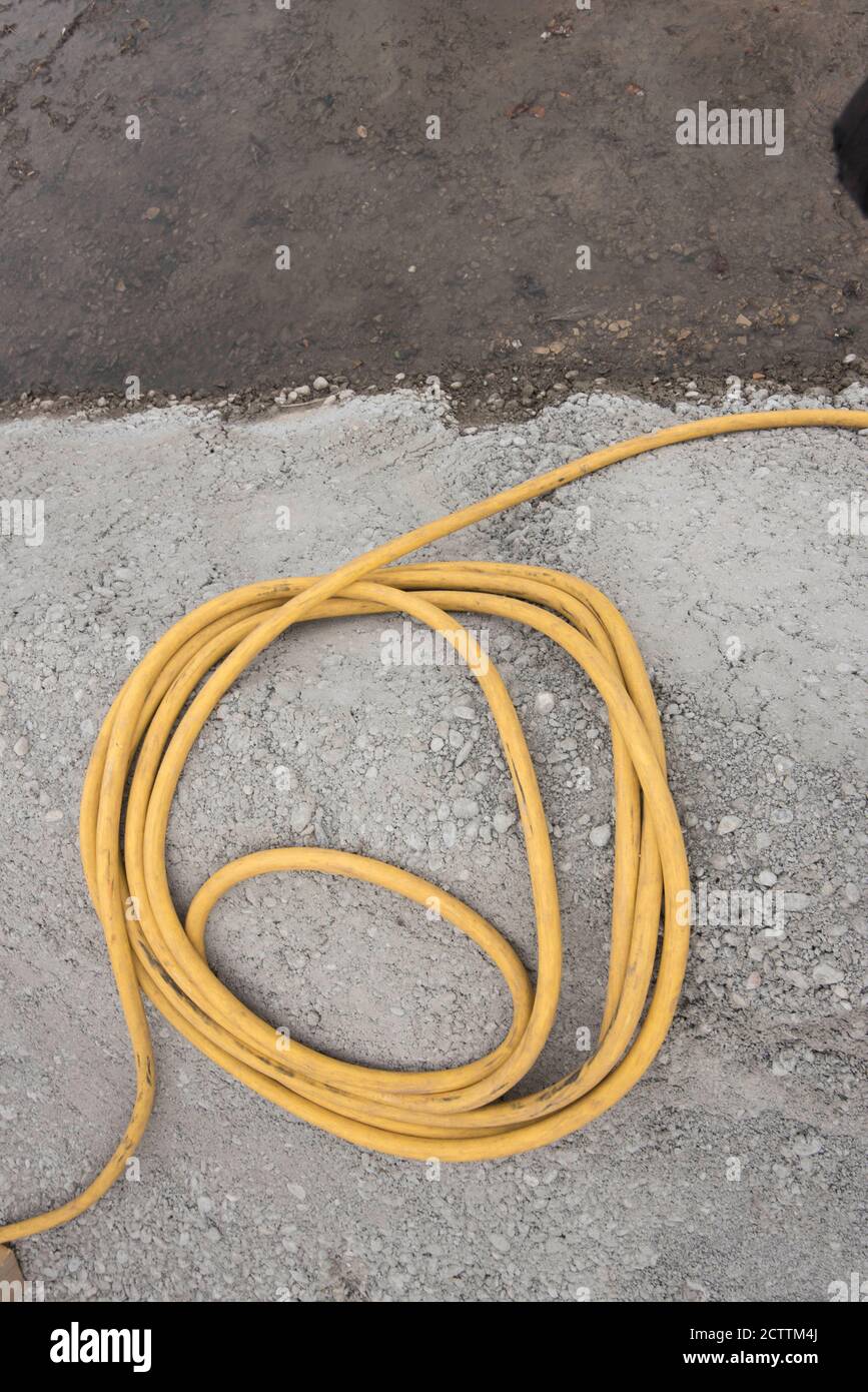 electric cable for plugging devices and machines with power Stock Photo ...