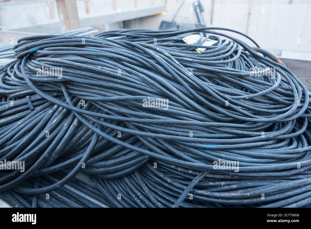 electric cable for plugging devices and machines with power Stock Photo ...