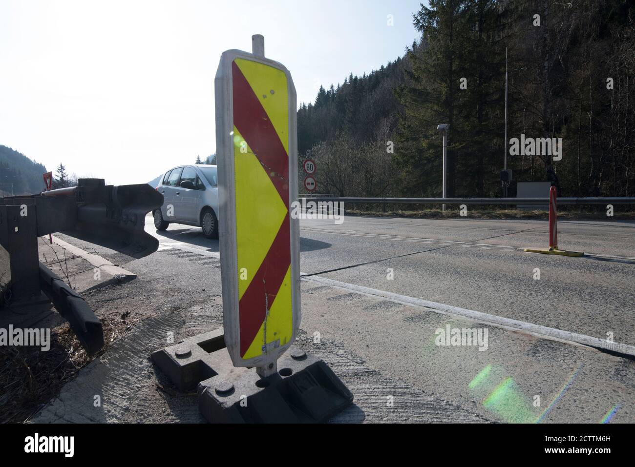 Direction sign with arrow showing the way in road traffic Stock Photo ...