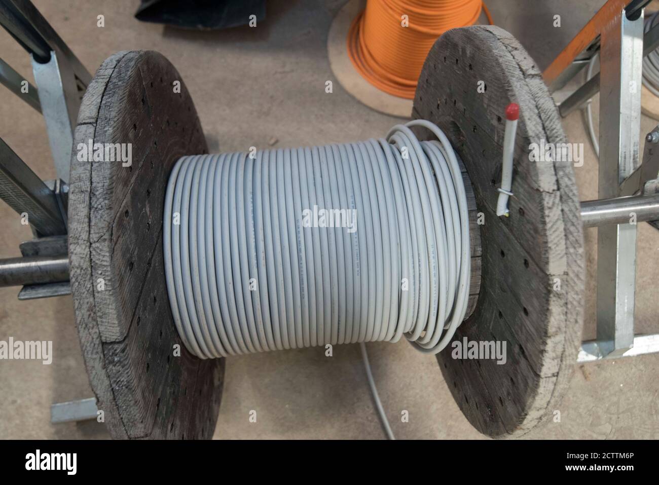 cable reel for plugging devices and machines with power Stock Photo - Alamy