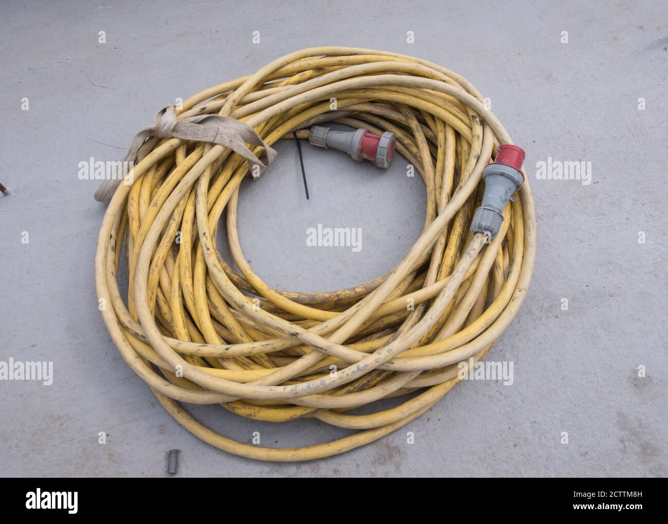 electric cable for plugging devices and machines with power Stock Photo ...