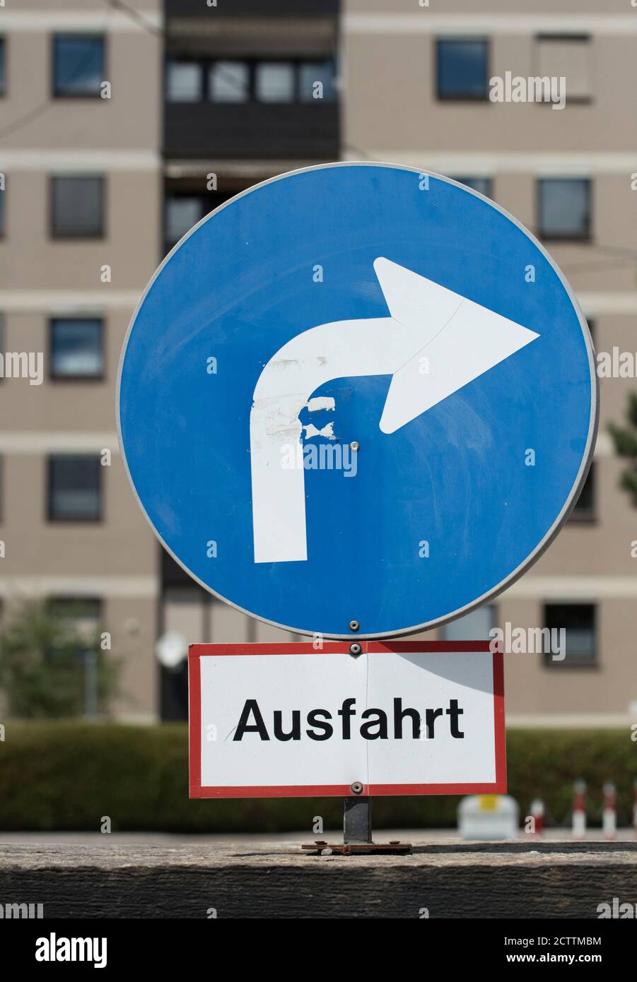 Direction sign with arrow showing the way in road traffic Stock Photo ...
