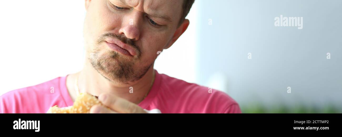 Man eating burger in fast food hi-res stock photography and images - Alamy