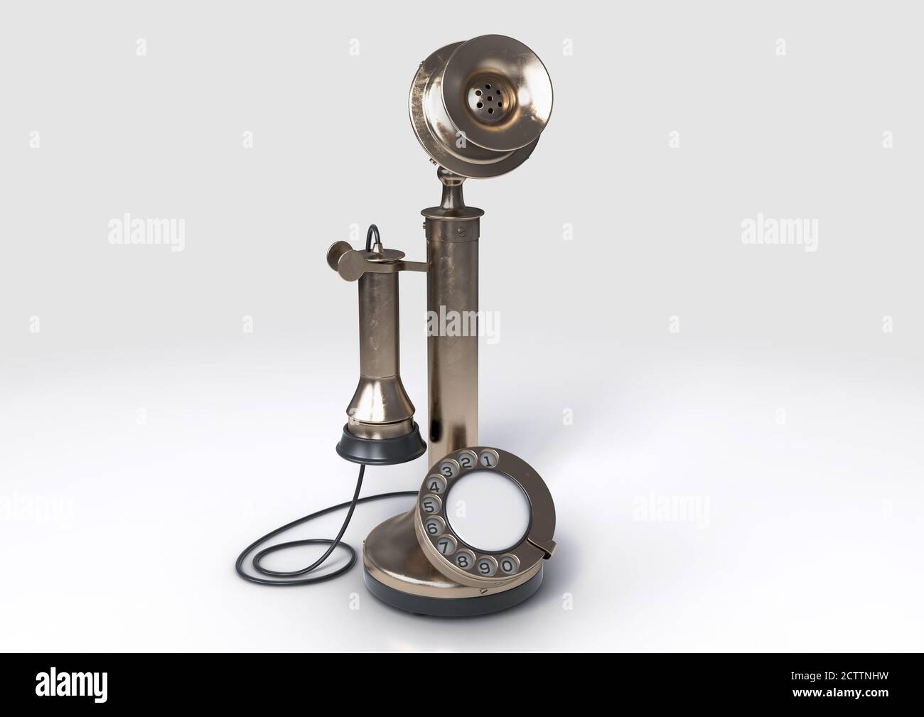 A vintage retro candlestick bell telephone made of brass on an isolated ...