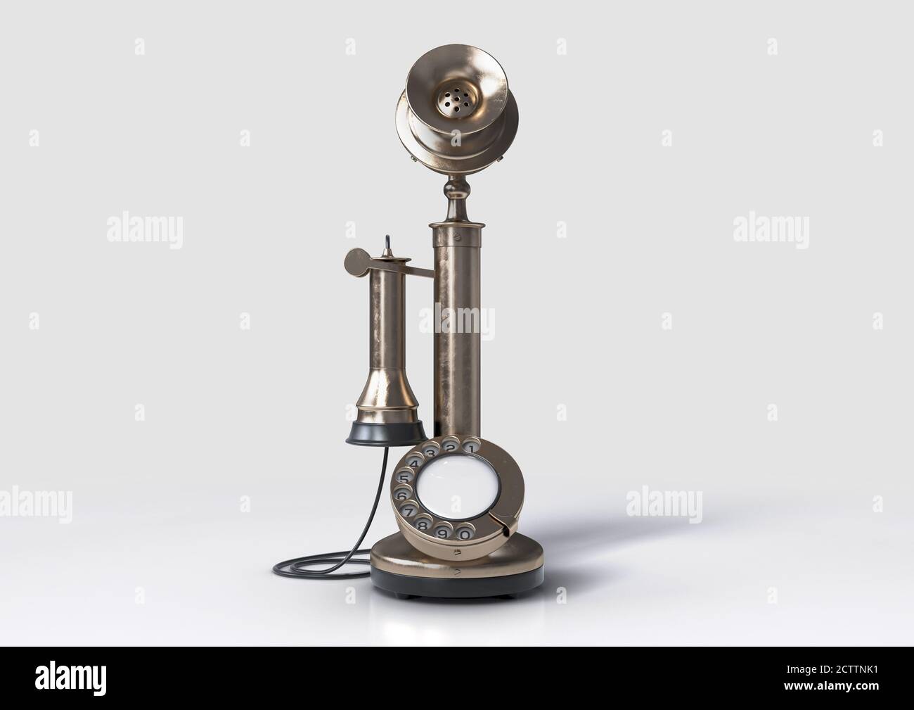 A vintage retro candlestick bell telephone made of brass on an isolated ...