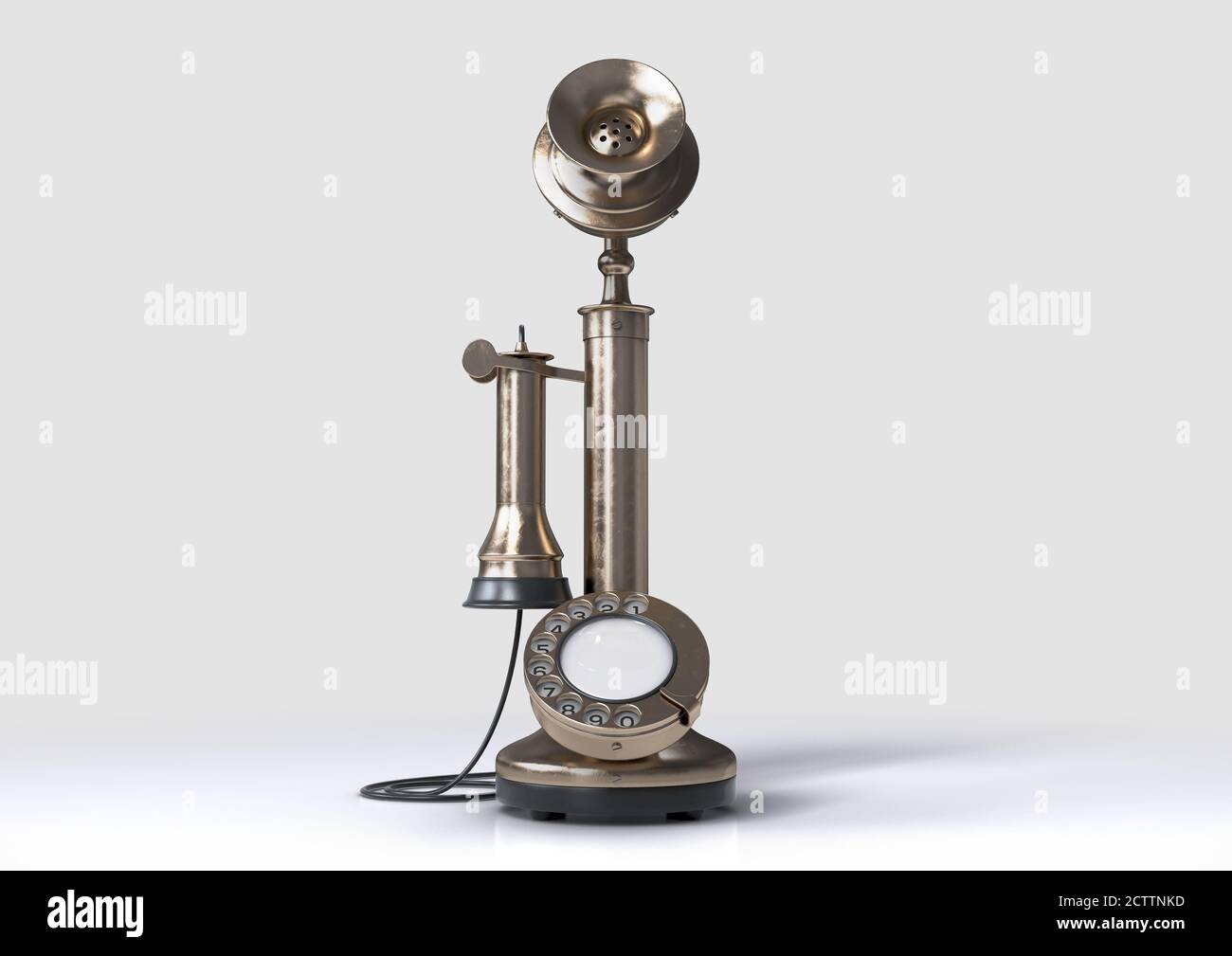 A vintage retro candlestick bell telephone made of brass on an isolated ...