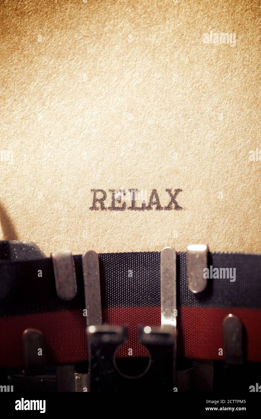 Relax word written with a typewriter Stock Photo - Alamy