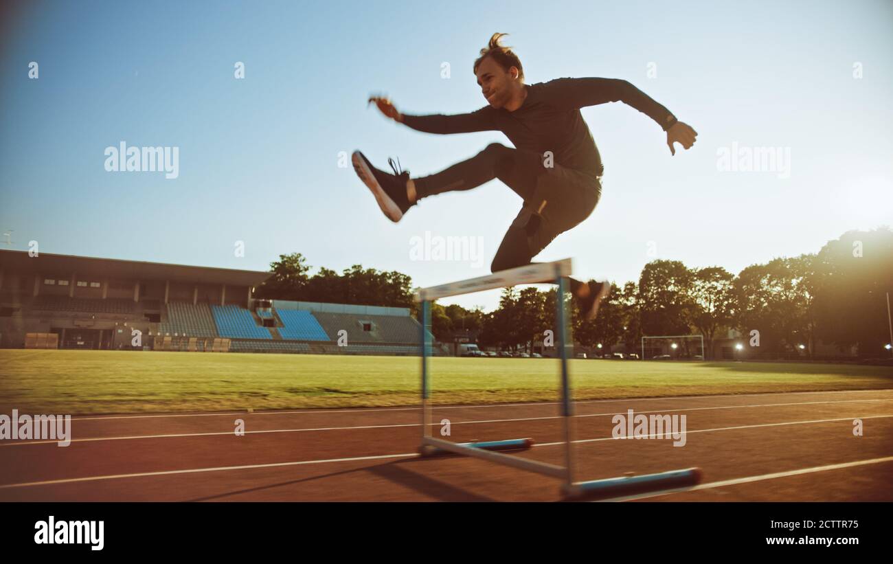 Athlete jump over barrier hi-res stock photography and images - Alamy