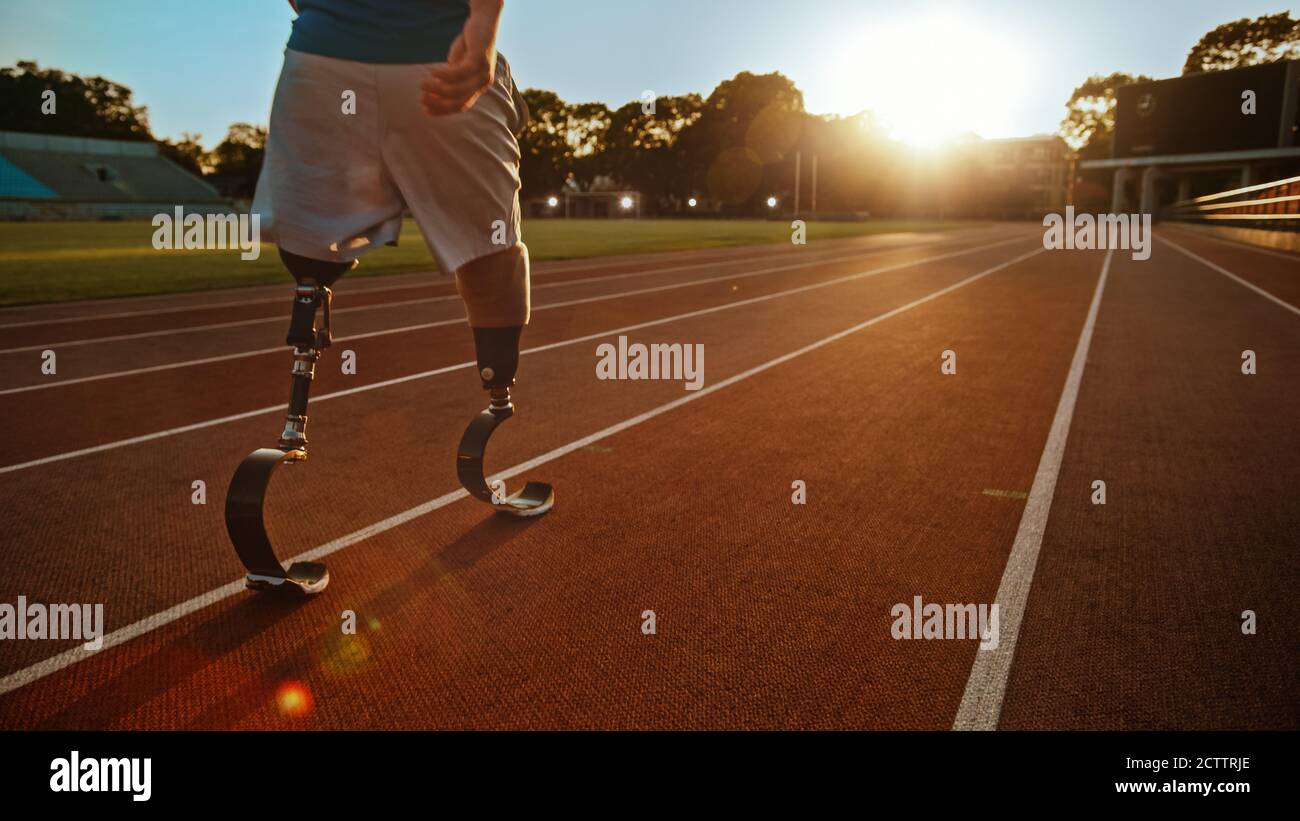 Athletic Disabled Fit Man with Prosthetic Running Blades is Walking ...