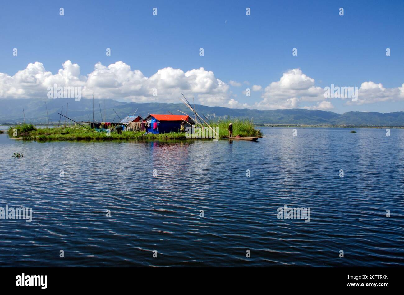 landscape and floating island at loktak lake manipur Stock Photo - Alamy