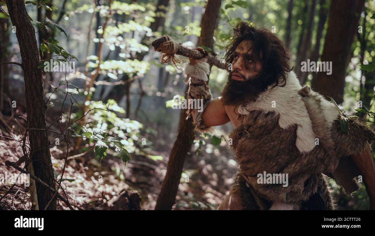 Close-up Portrait of Primeval Caveman Wearing Animal Skin and Fur ...