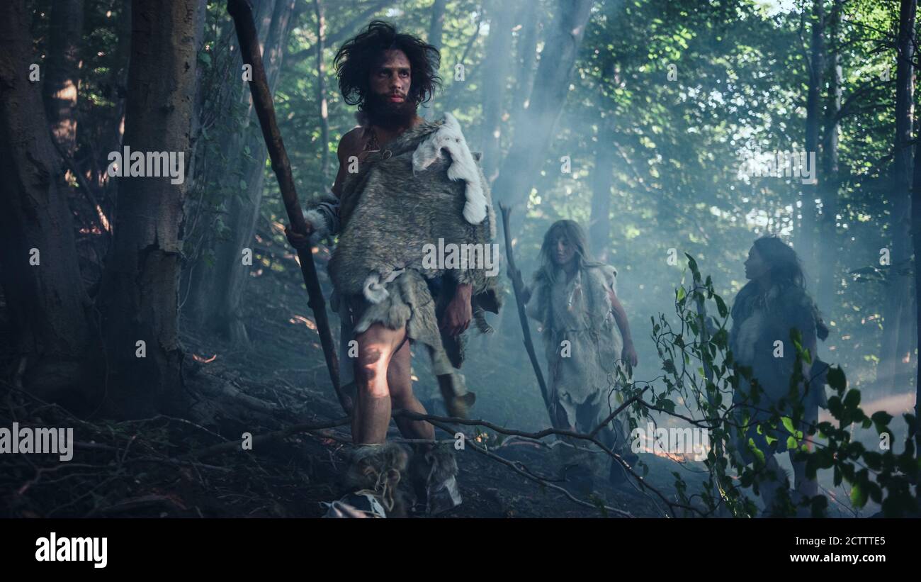 Tribe of Hunter-Gatherers Wearing Animal Skin Holding Stone Tipped ...