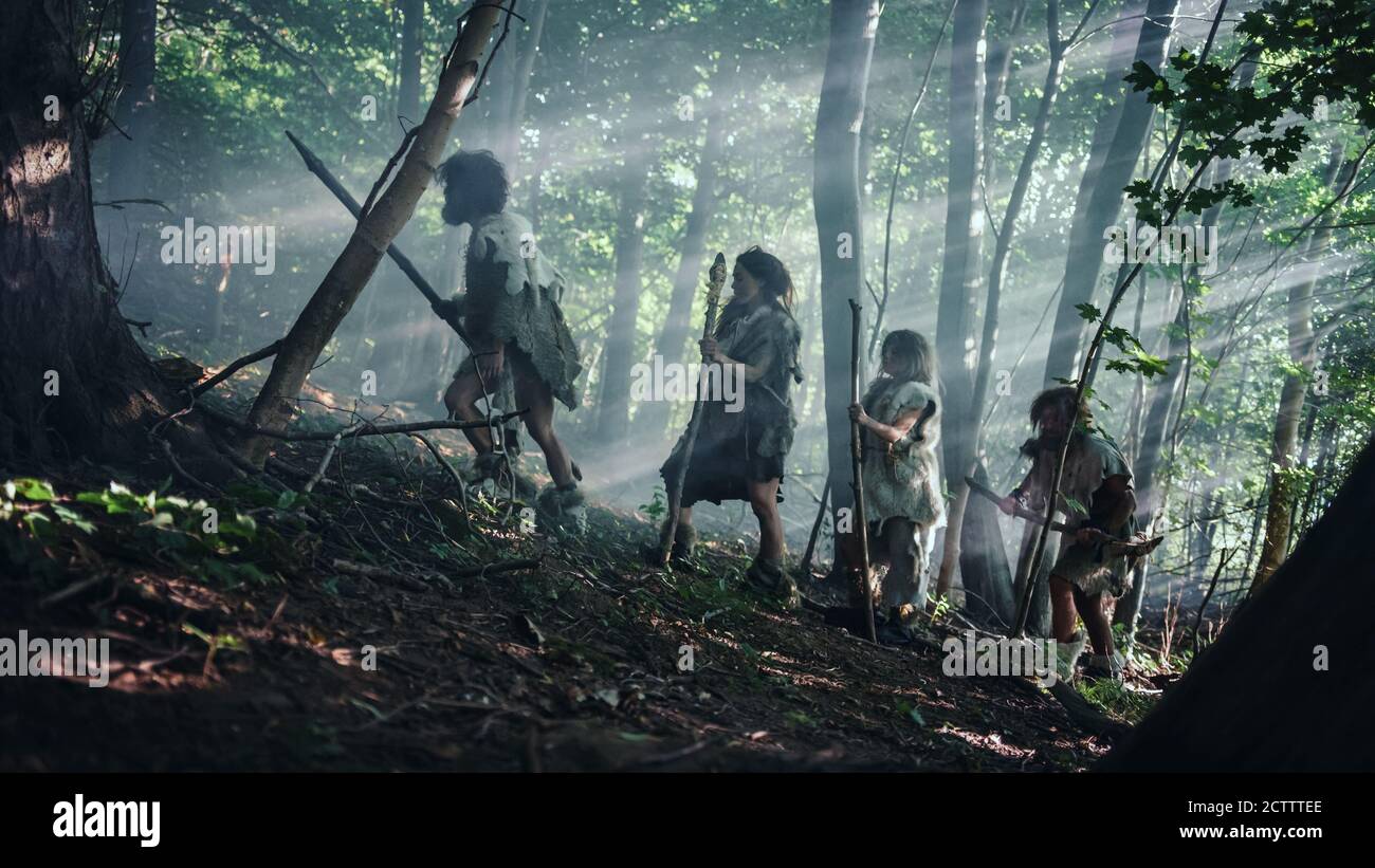 Tribe of Hunter-Gatherers Wearing Animal Skin Holding Stone Tipped ...