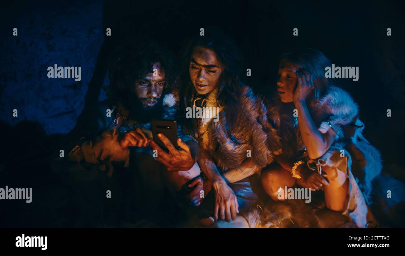 Tribe of Prehistoric, Primitive Hunter-Gatherers Wearing Animal Skins ...