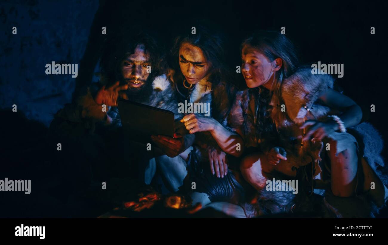 Tribe of Prehistoric, Primitive Hunter-Gatherers Wearing Animal Skins ...