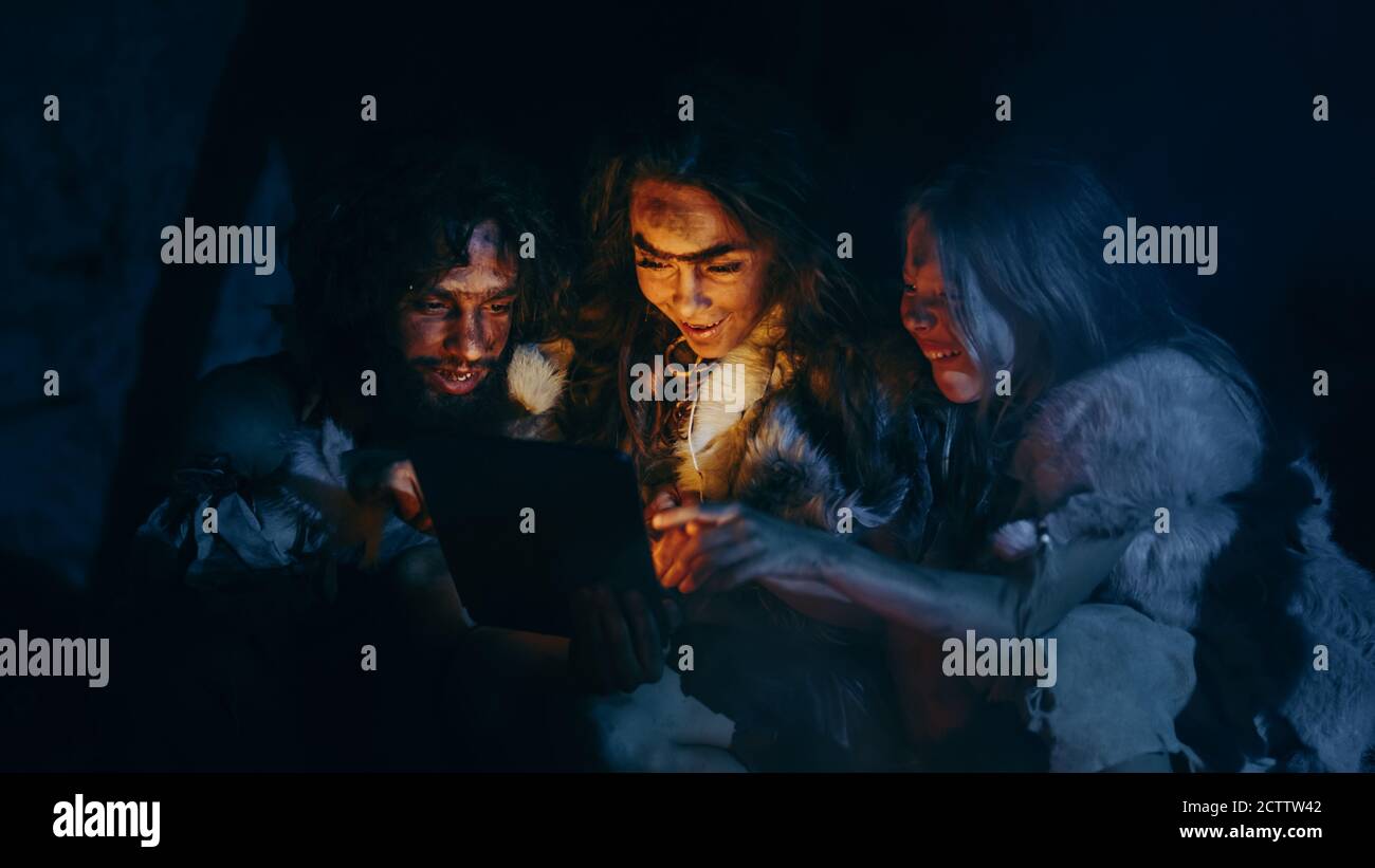 Tribe of Prehistoric, Primitive Hunter-Gatherers Wearing Animal Skins ...