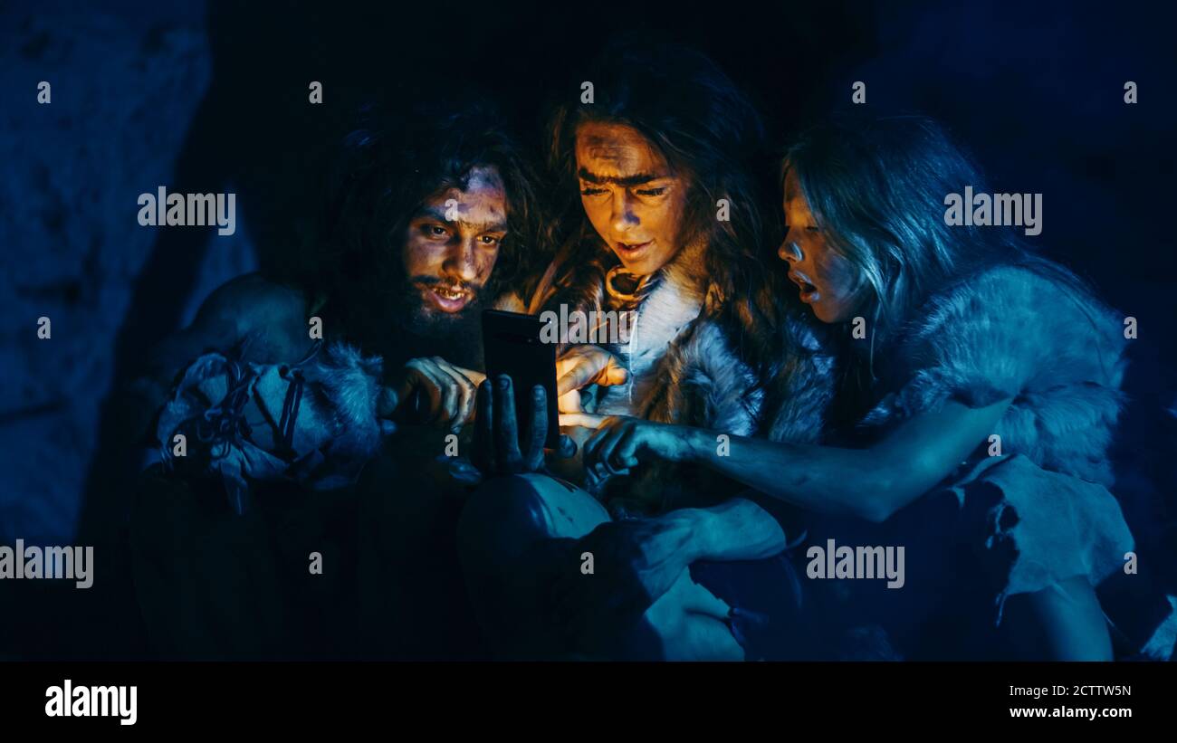 Tribe of Prehistoric, Primitive Hunter-Gatherers Wearing Animal Skins ...