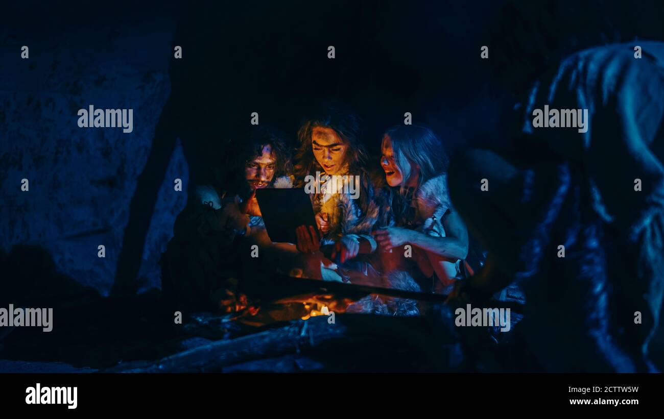 Tribe of Prehistoric, Primitive Hunter-Gatherers Wearing Animal Skins ...