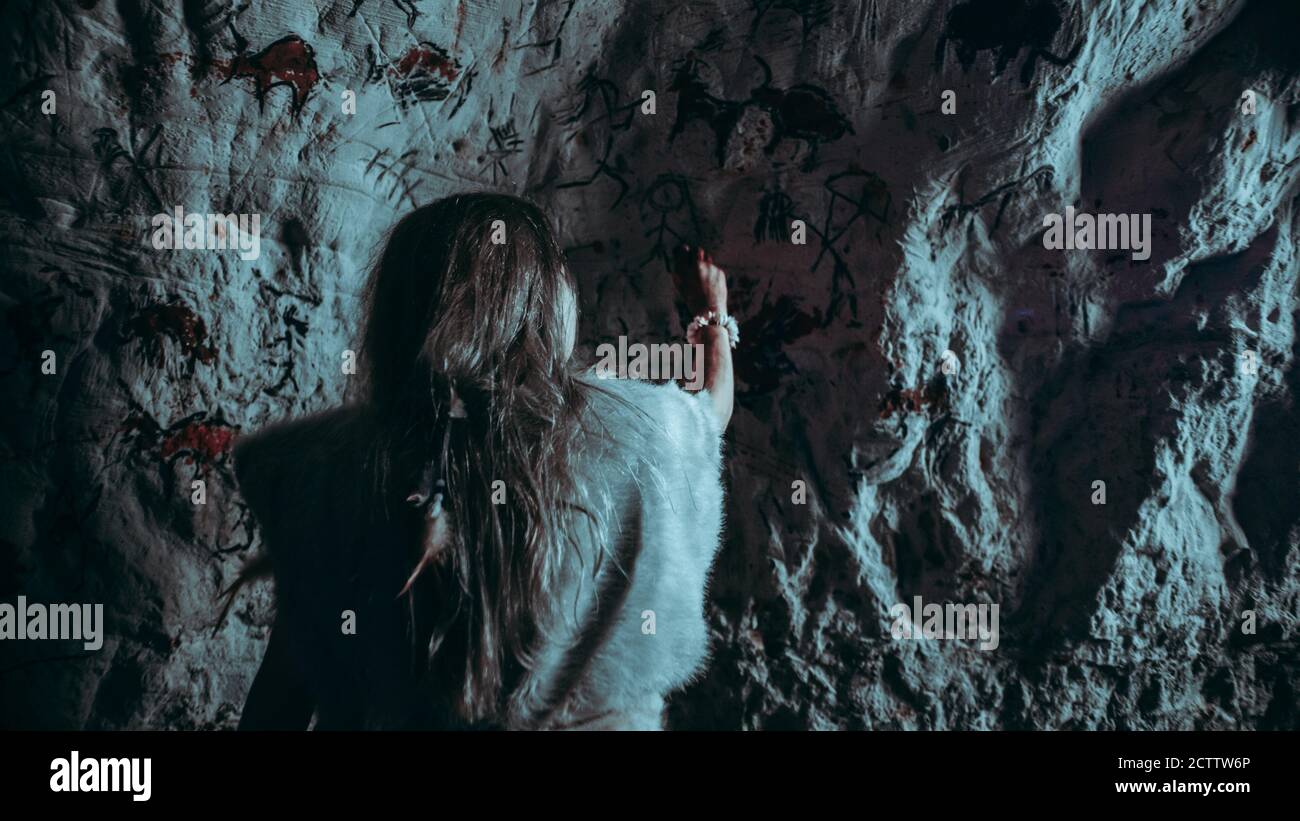 Back View of Primitive Prehistoric Neanderthal Child in Animal Skin ...