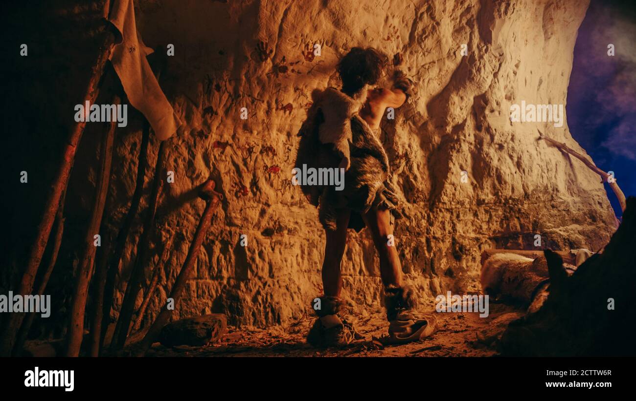 Back View of Primitive Prehistoric Neanderthal Wearing Animal Skin ...