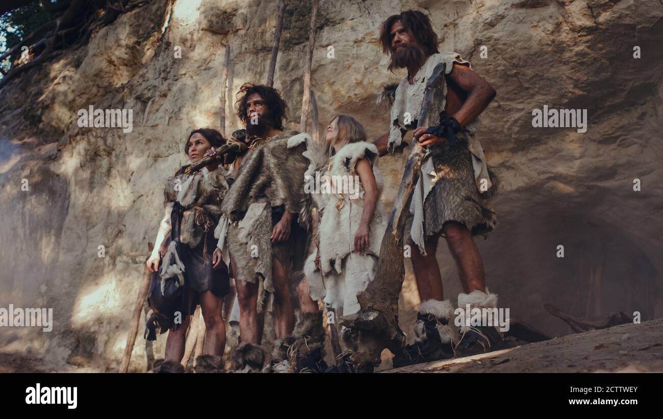 Tribe of Hunter-Gatherers Wearing Animal Skin Holding Stone Tipped ...