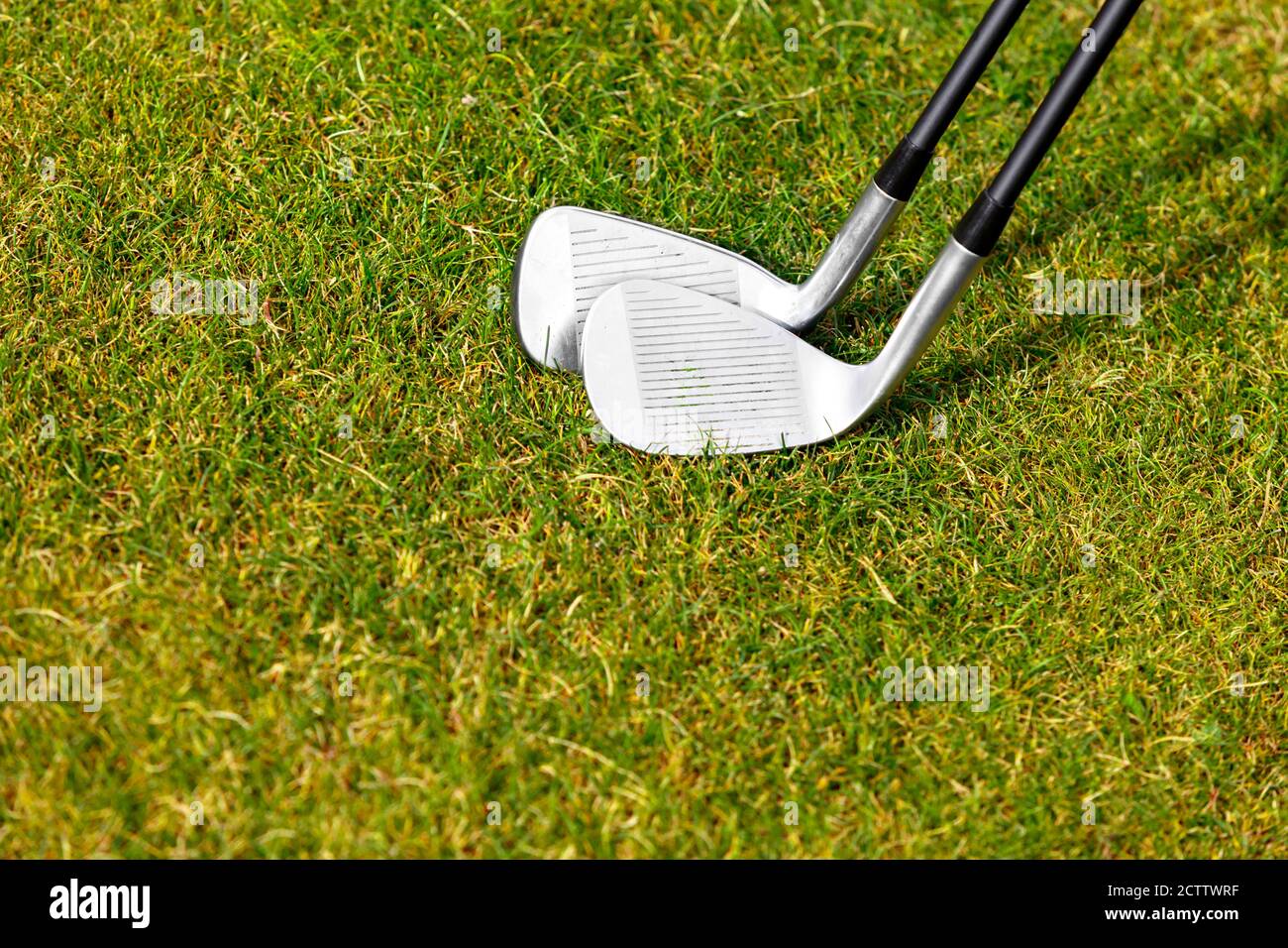 Golf clubs on the green grass. The concept of the game of Golf Stock ...