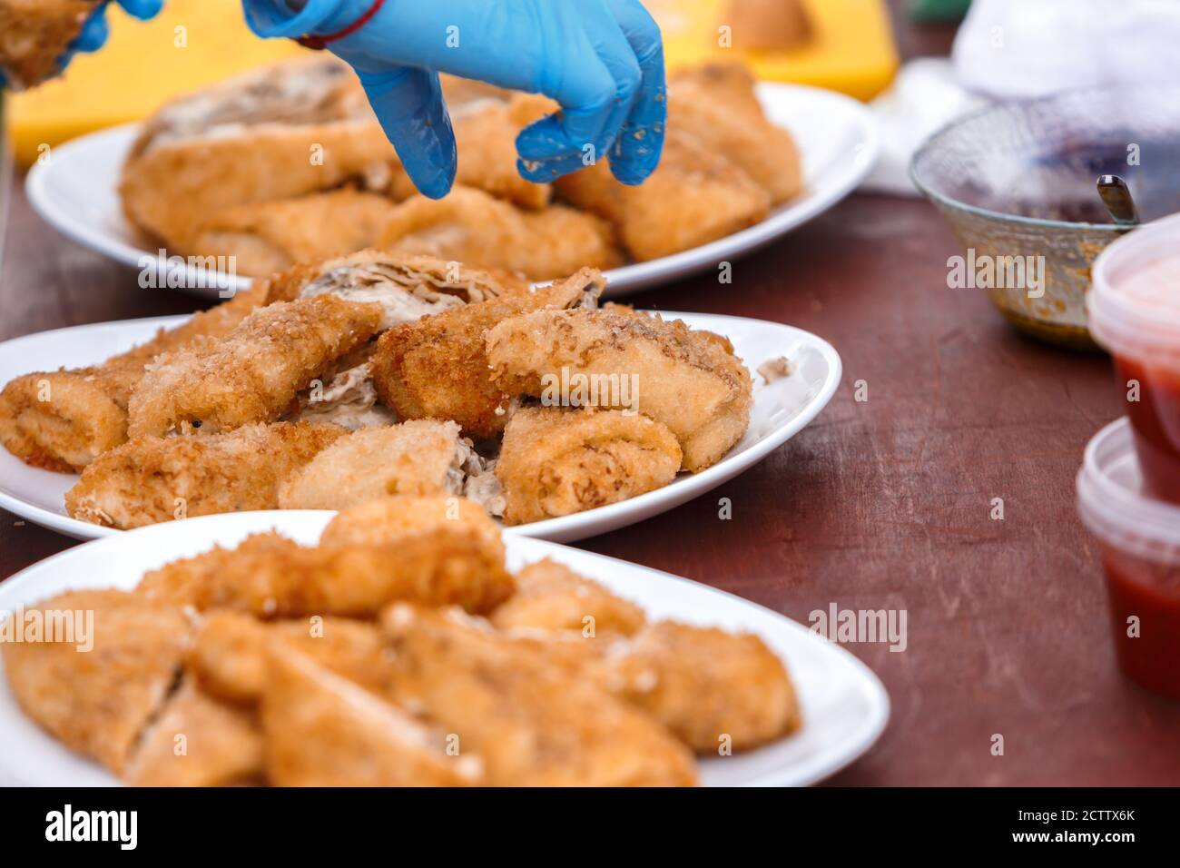 Cooking by an outdoor chef. Catering Stock Photo - Alamy