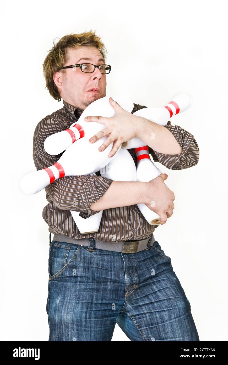 A man with bowling pins Stock Photo - Alamy