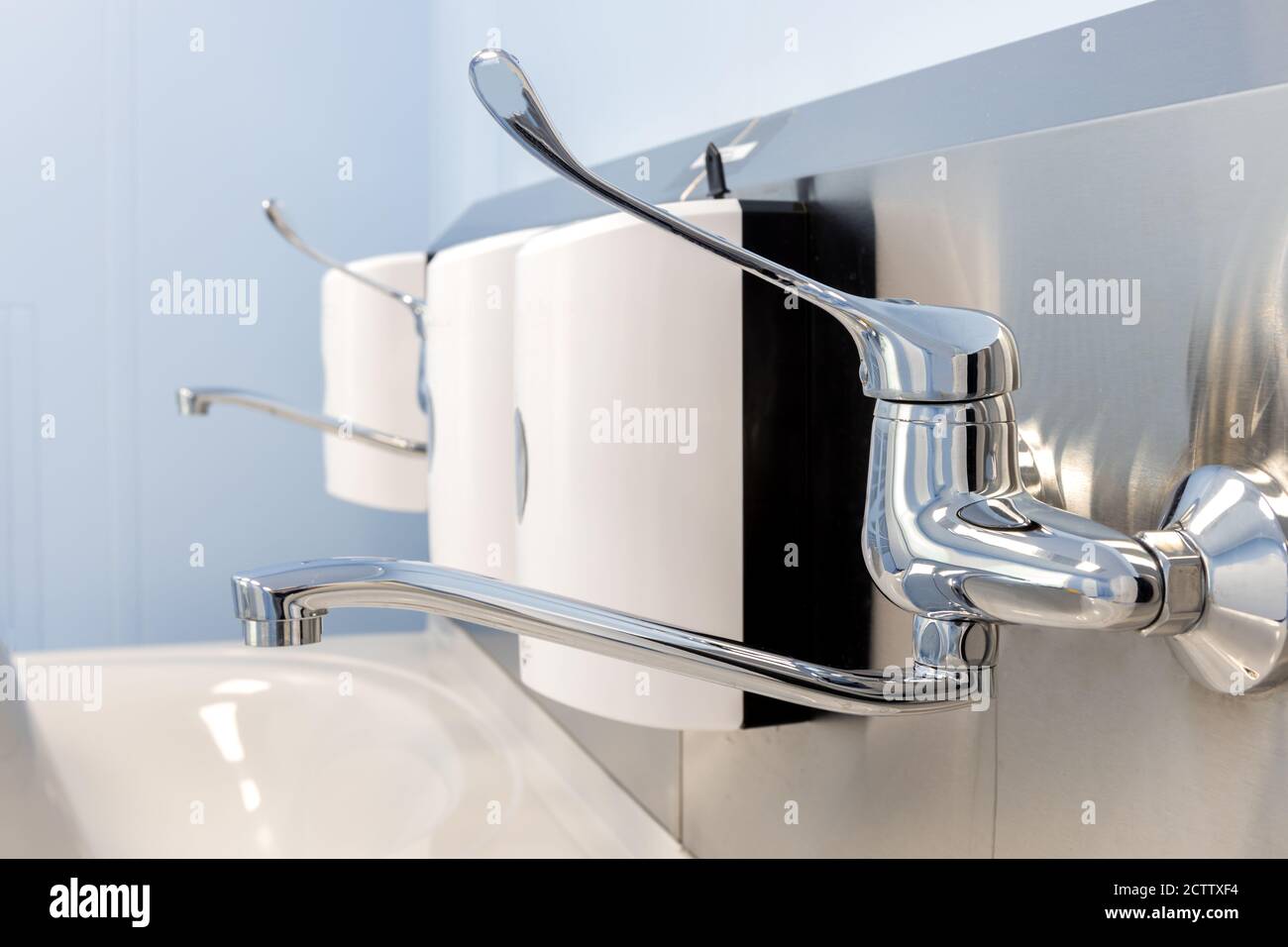 Washbasin tap for medical workers close-up. Sanitary equipment Stock ...