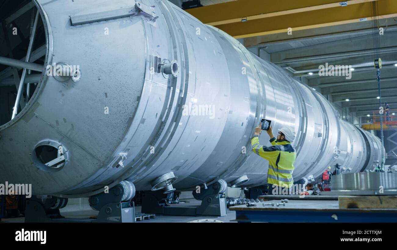 Heavy Industry Engineer Uses Augmented Reality Digital Tablet to Scan ...