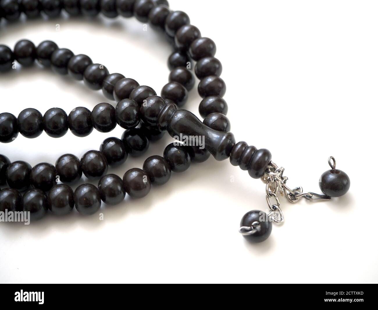 99 Islamic prayer beads on a white background Stock Photo - Alamy