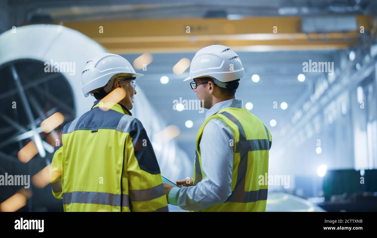 Engineers in professional uniform stand hi-res stock photography and ...