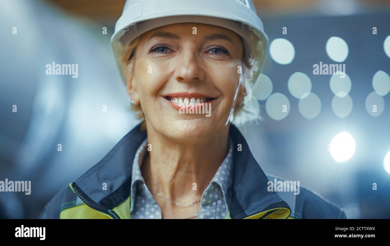Portrait of Professional Heavy Industry Female Engineer Wearing Safety ...