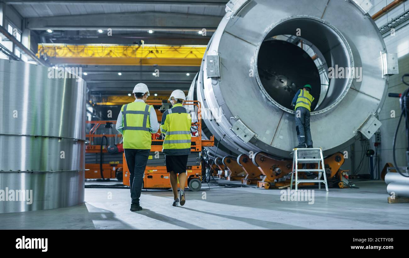 Industry engineer walk through pipe hi-res stock photography and images ...