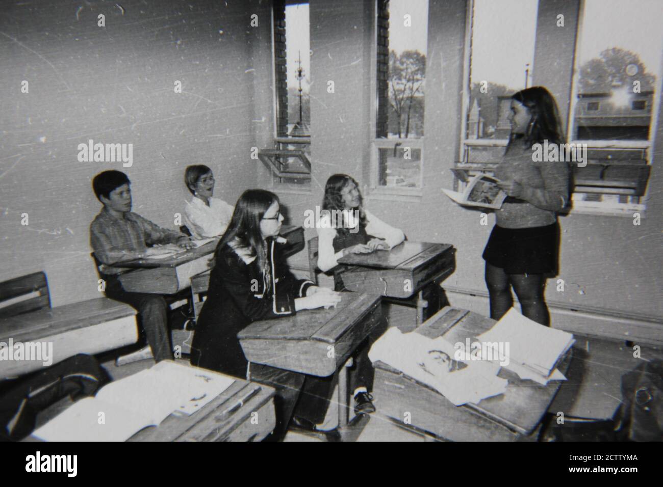Fine 1970s vintage black and white photography of elementary school students siting in their ...
