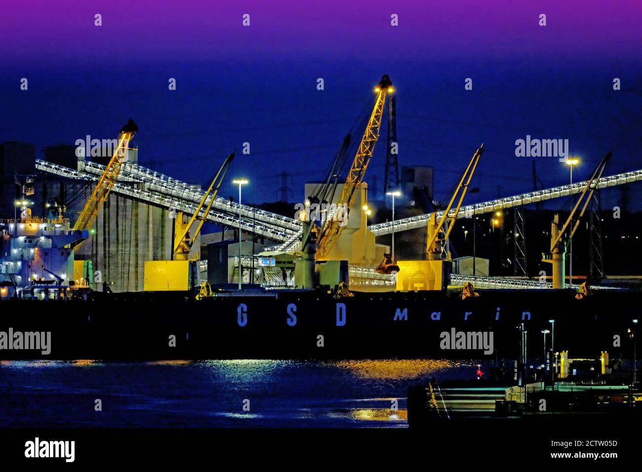 GSD Marin ship Mila unloading coal fuel at night via conveyer belts at ...