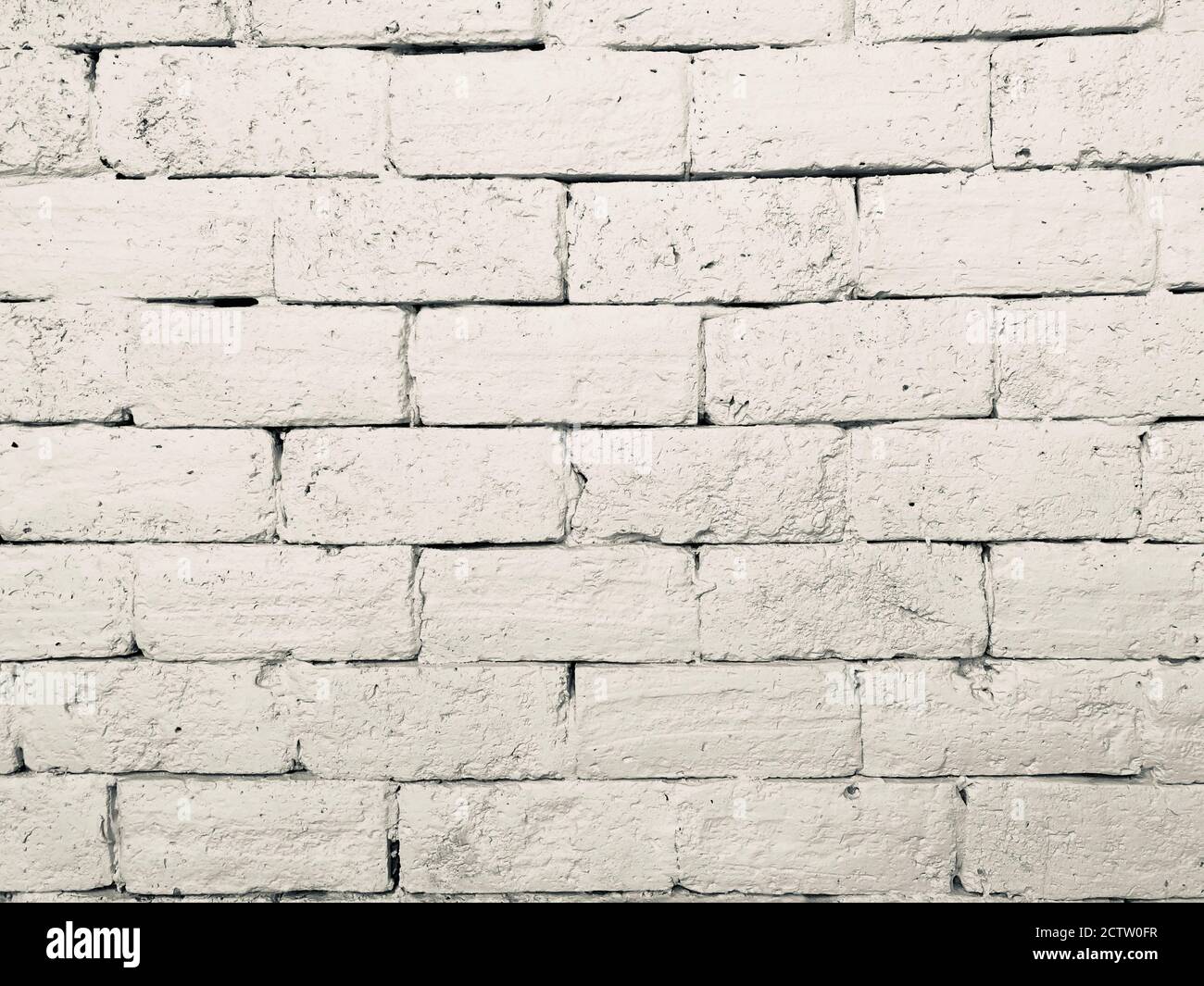 White stone brick wall vintage color tone for building wallpaper or ...