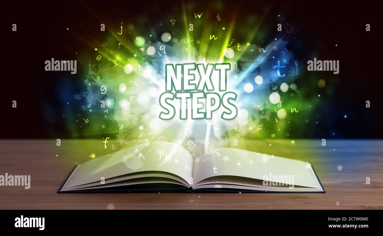 NEXT STEPS inscription coming out from an open book, educational ...